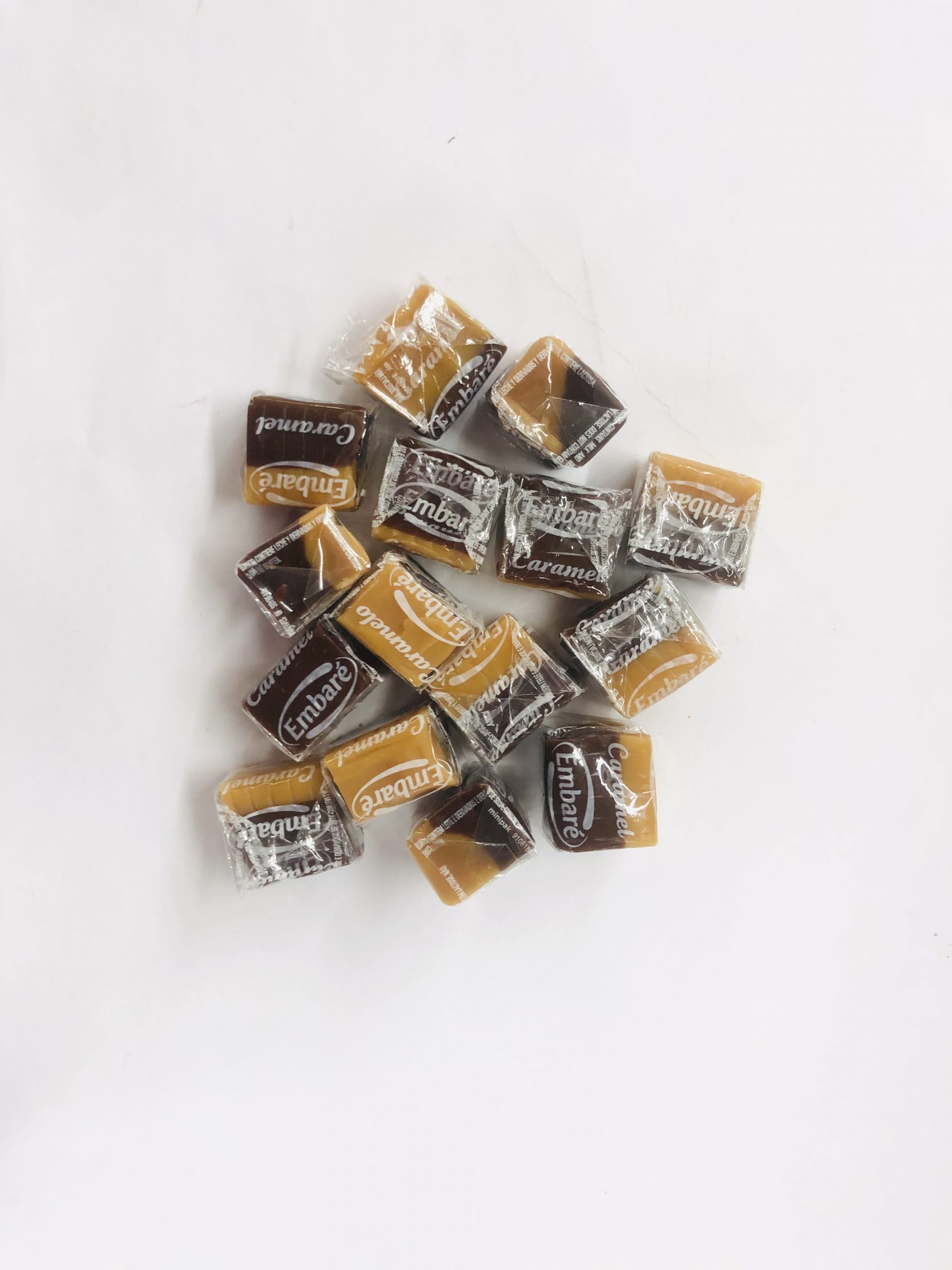 Bala Caramelo Meio a Meio Leite e Chocolate A granel 100g - Produtos do ...